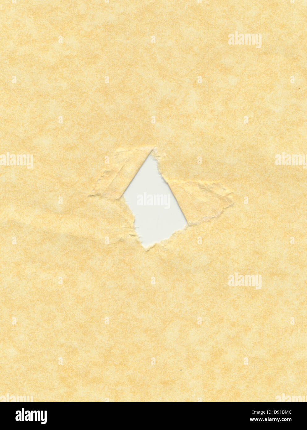 A hole in the paper Stock Photo - Alamy