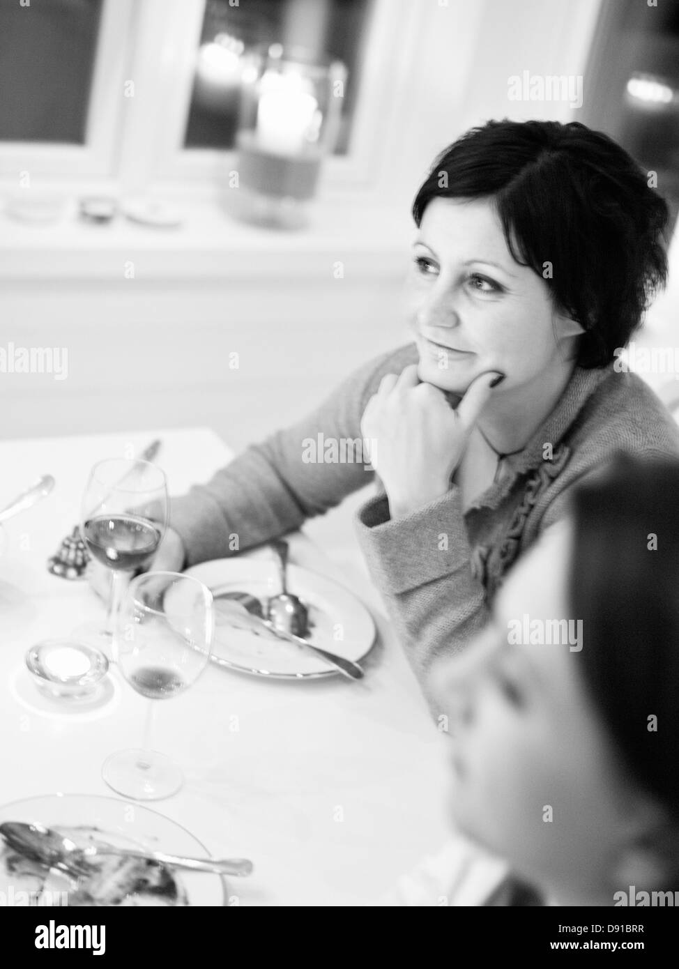 Women use table hi-res stock photography and images - Alamy