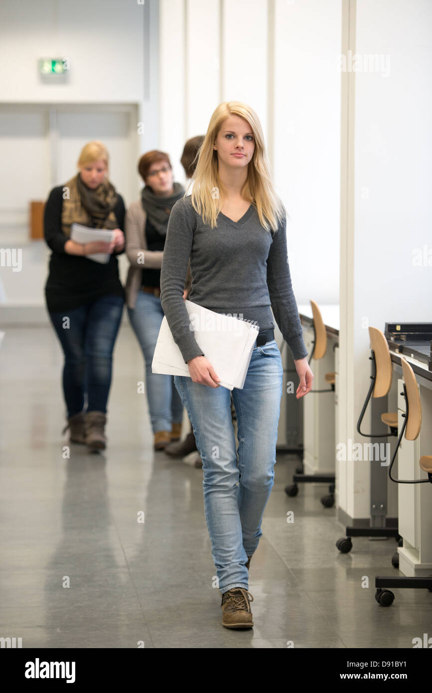 female students in university corridor near window Stock Photo - Alamy