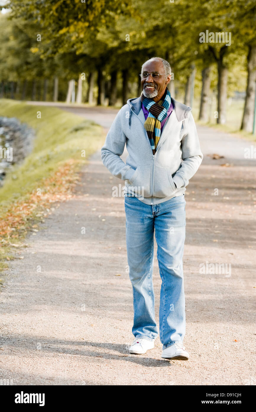 A senior man taking a walk Stock Photo - Alamy