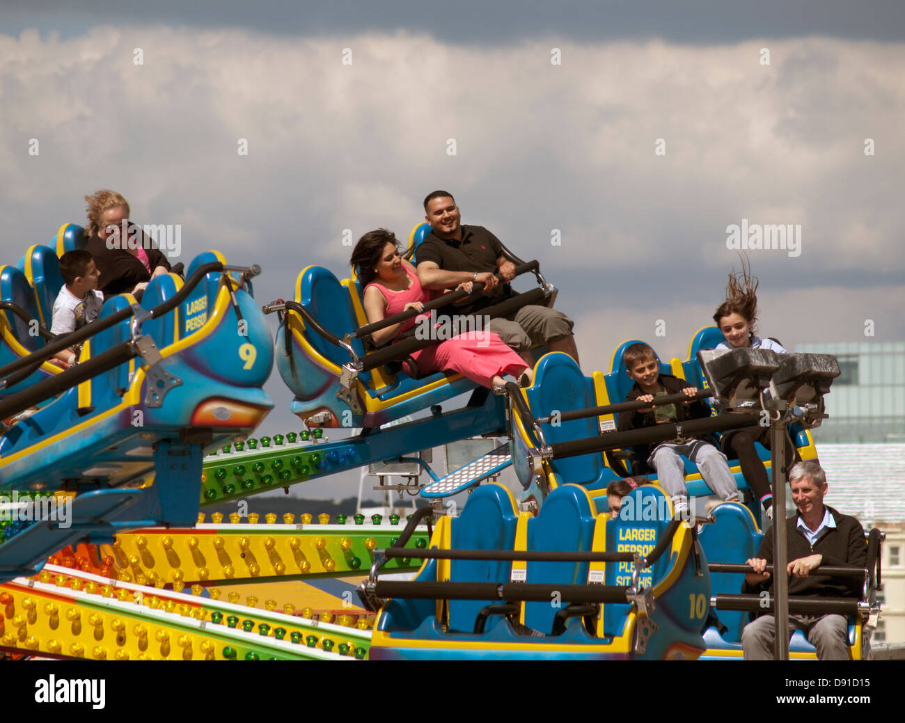 People enjoying themselves on an amusement ride on Brighton Pier Stock ...