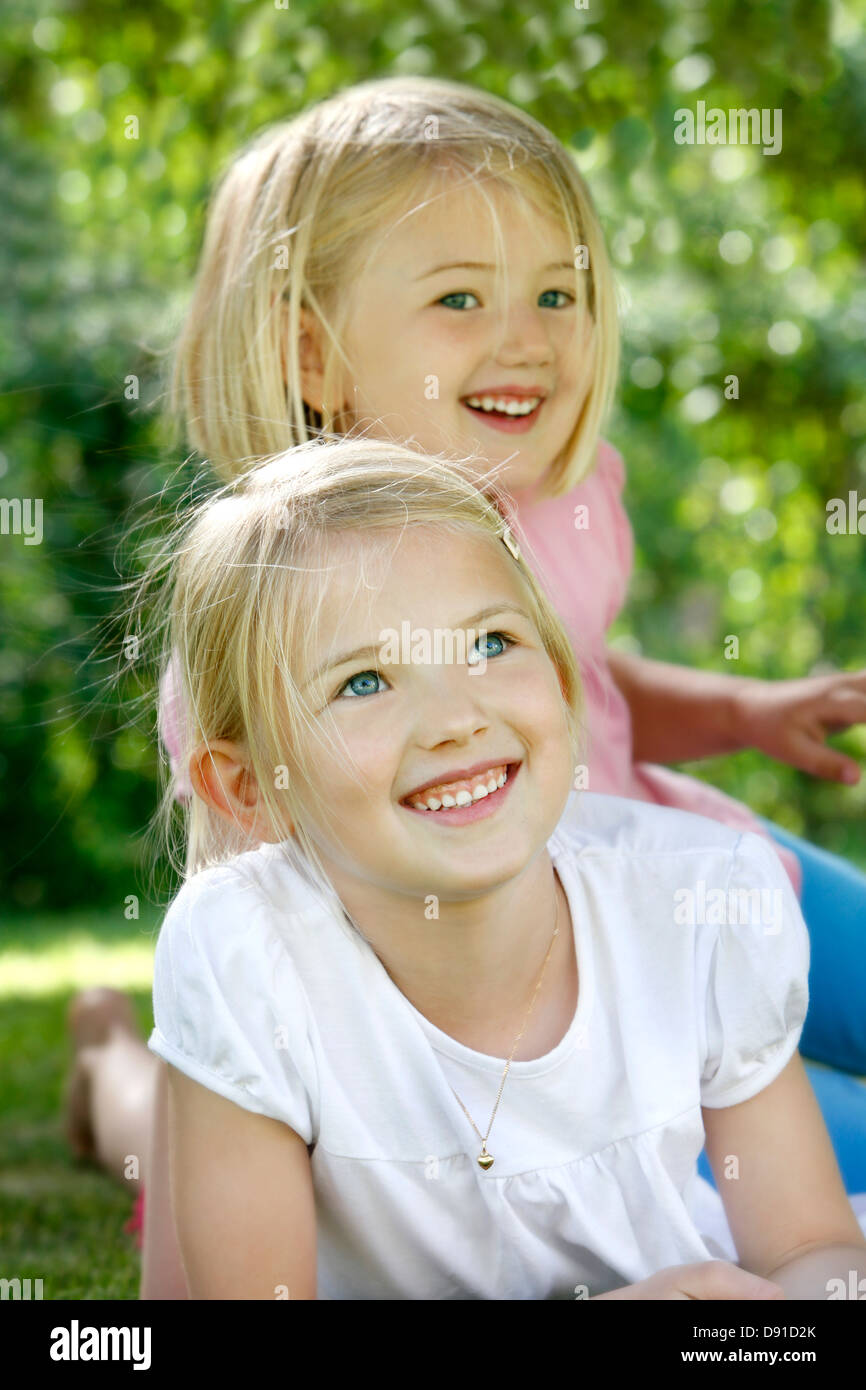 Two Scandinavian girls laughing Stock Photo - Alamy