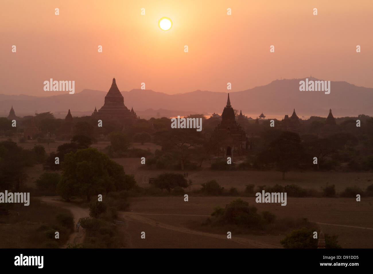 Sunset over the Plain of Temples in Bagan viewed from the terraces of the Shwesandaw Paya temple ...