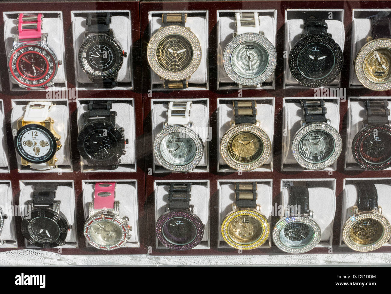 Watch display in shop window Stock Photo - Alamy