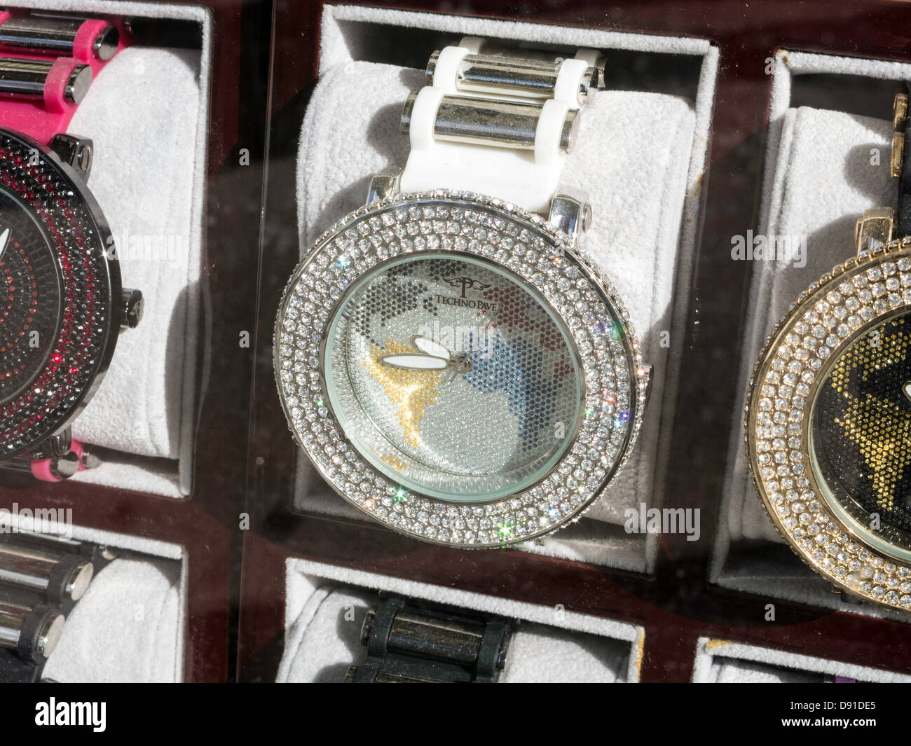 Watch display in shop window Stock Photo - Alamy