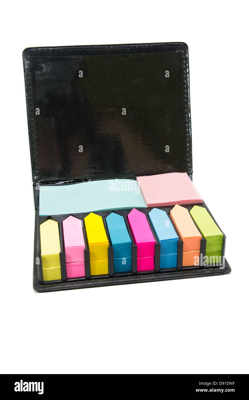 The set of colorful sticky note paper in a box isolated on white ...