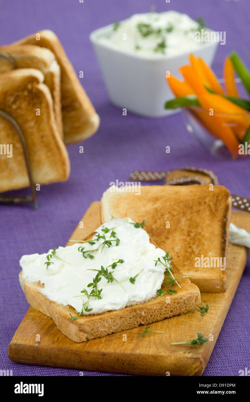 Toast with cream cheese Stock Photo - Alamy