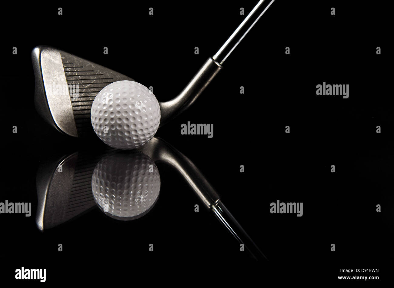 Image of a golf club and ball with reflection Stock Photo - Alamy