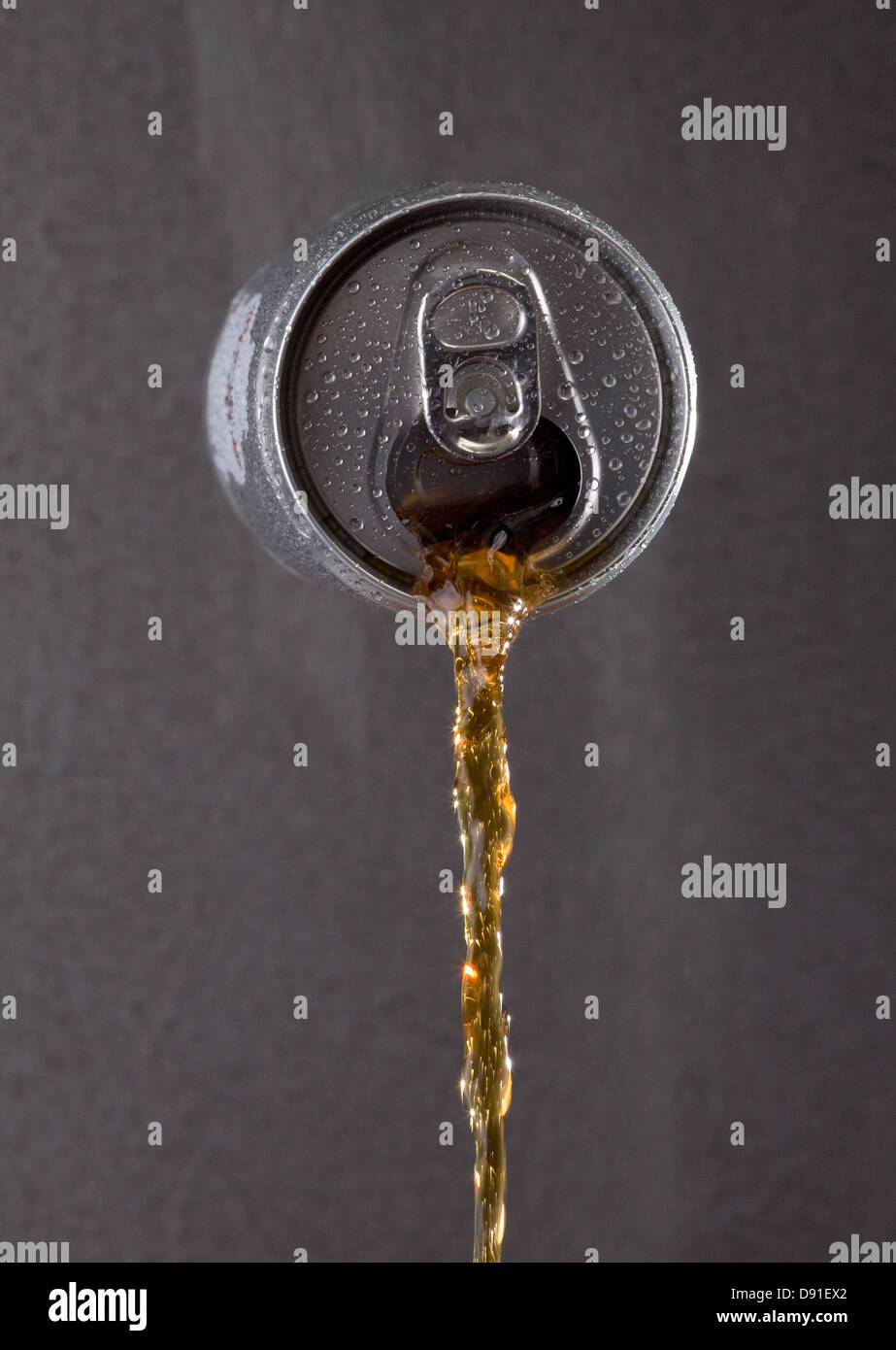 Beverage can is poured Stock Photo - Alamy
