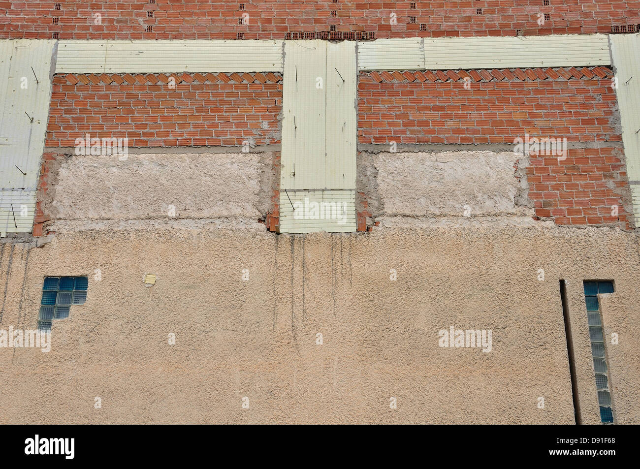 Brick wall and insulation material background. Building under ...