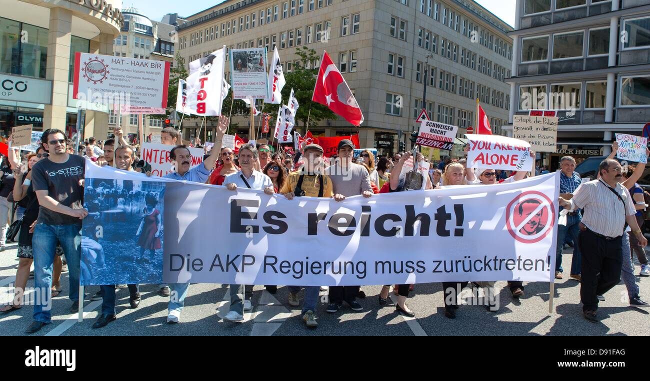 People demonstrate with banners and posters and show their solidarity ...