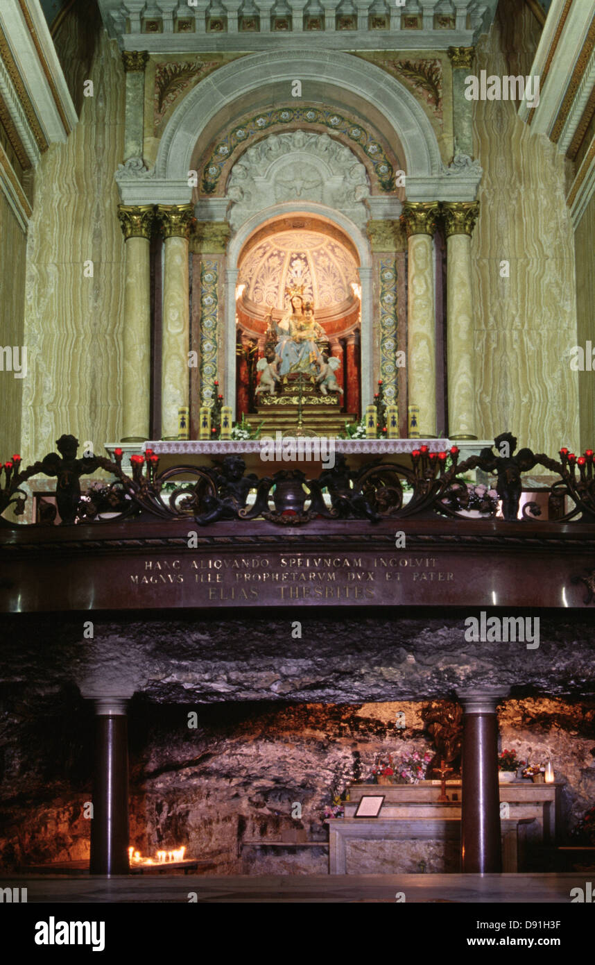 Church interior with the venerated cave visible under the altar ...