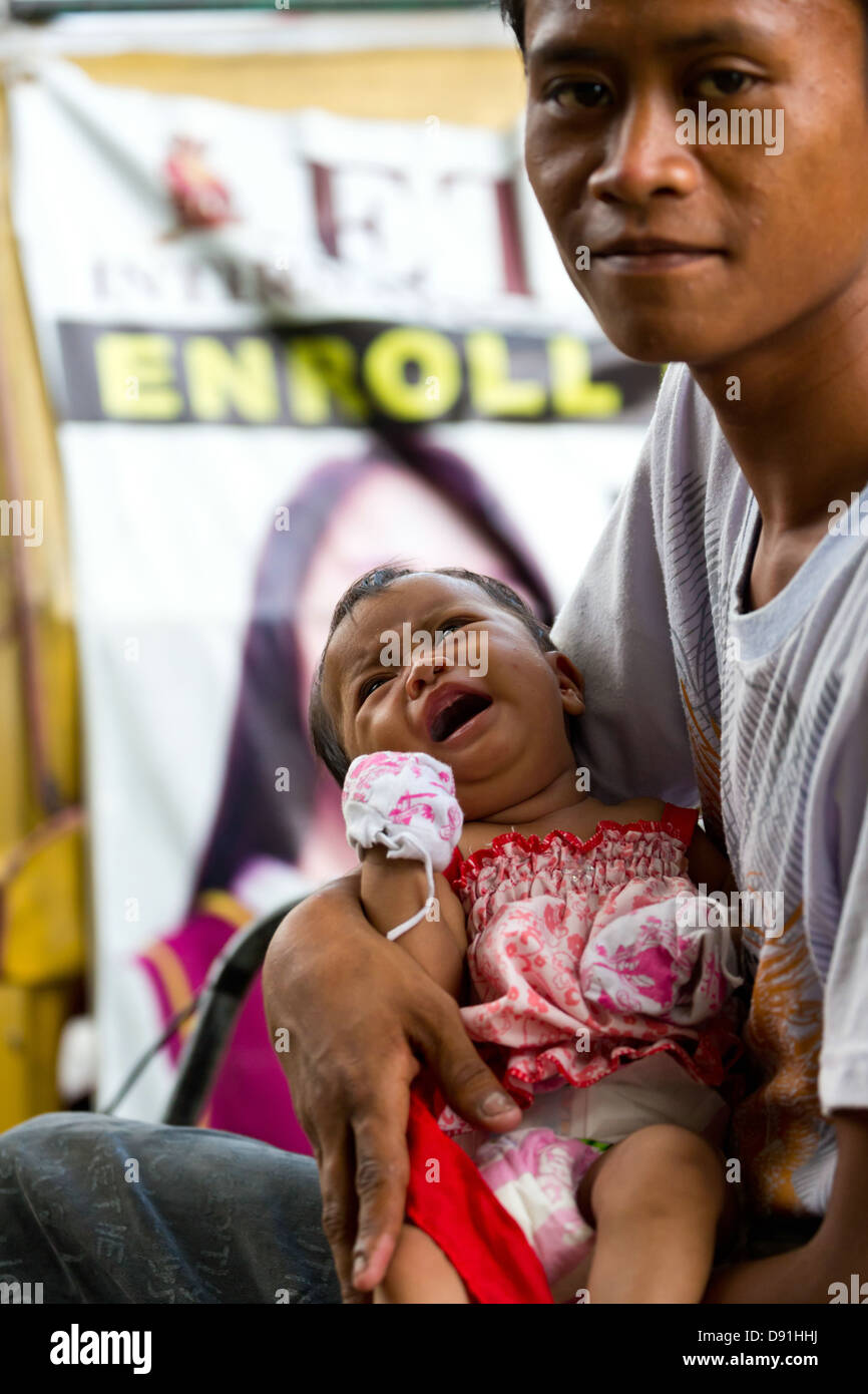 Little Baby Boy crying in Manila, Philippines Stock Photo - Alamy