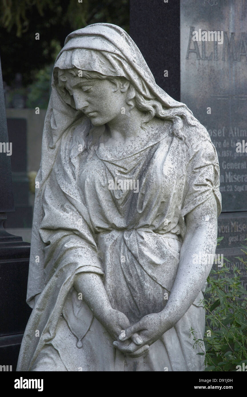 grave figure at Vienna's Central Cemetery Stock Photo - Alamy