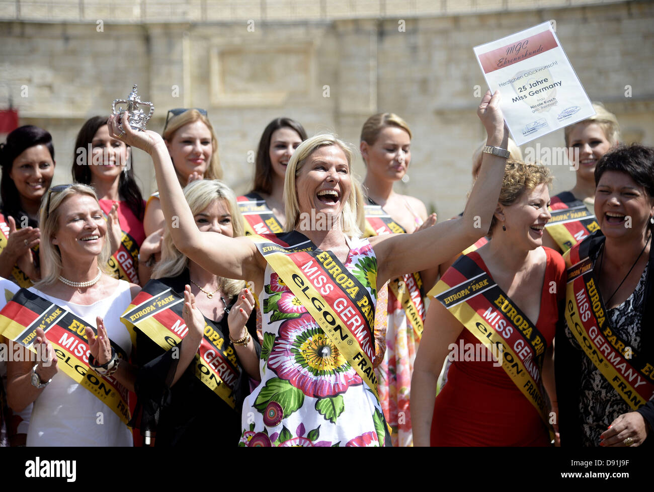 Miss Germany of 1988/89, Nicole Kusch, cheers after receiving an award ...