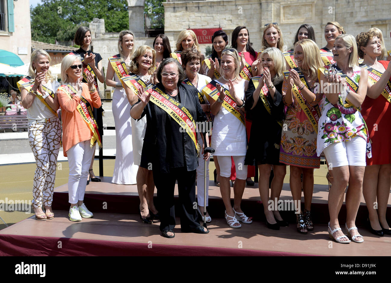 Miss Germany of 1963, Helga Carla Rosenkranz (C), cheers after ...
