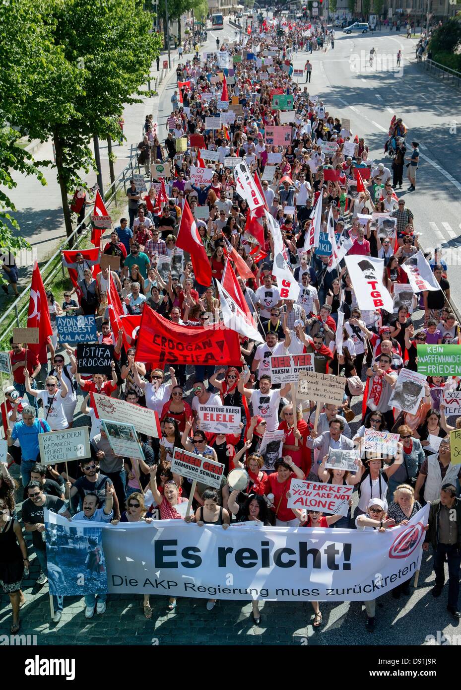 People demonstrate with banners and posters and show their solidarity ...