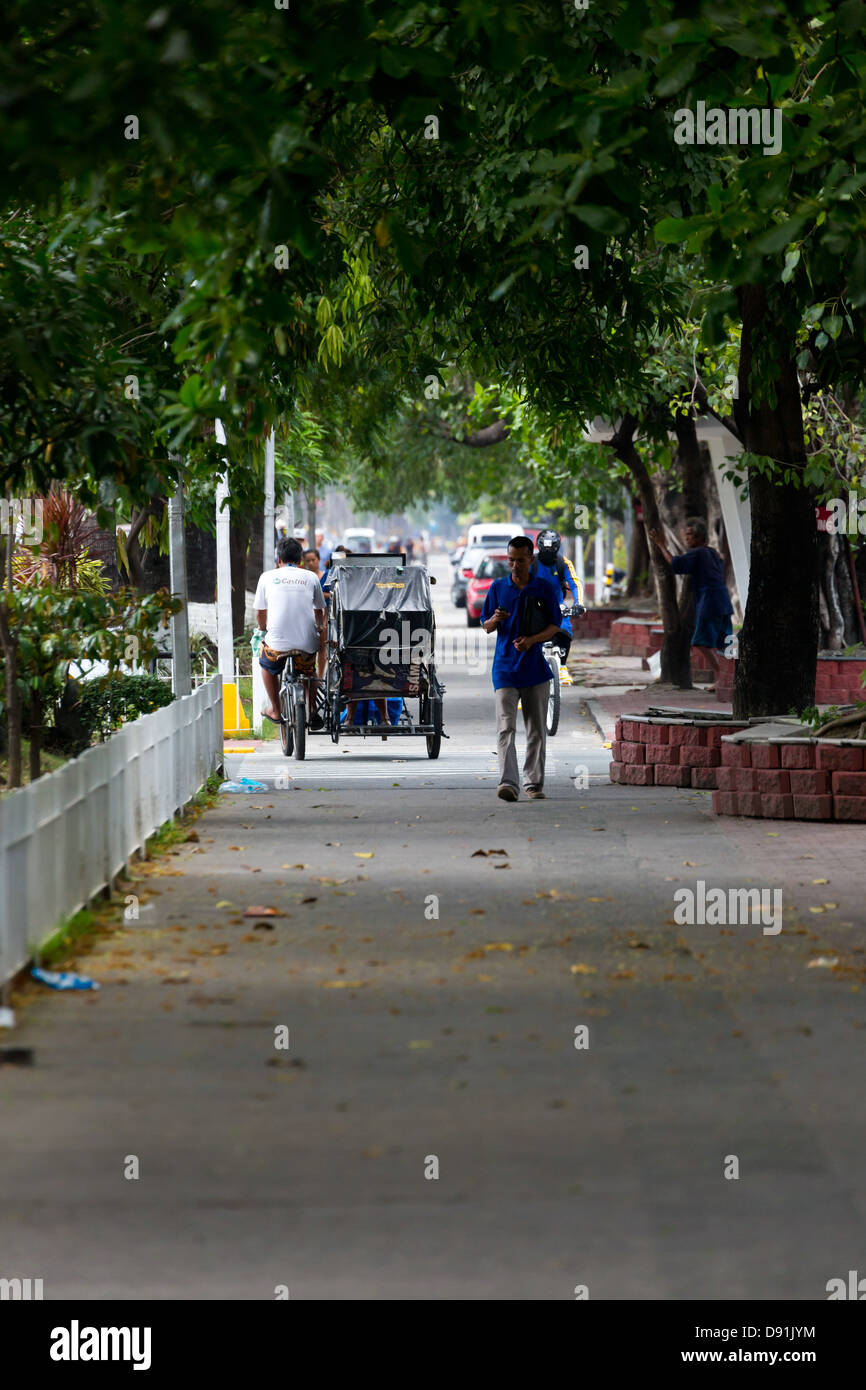 Alley alongside the Manila Bay Walk in Manila, Philippines Stock Photo ...