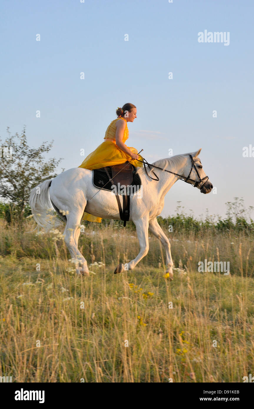 Riding with side saddle Stock Photo - Alamy