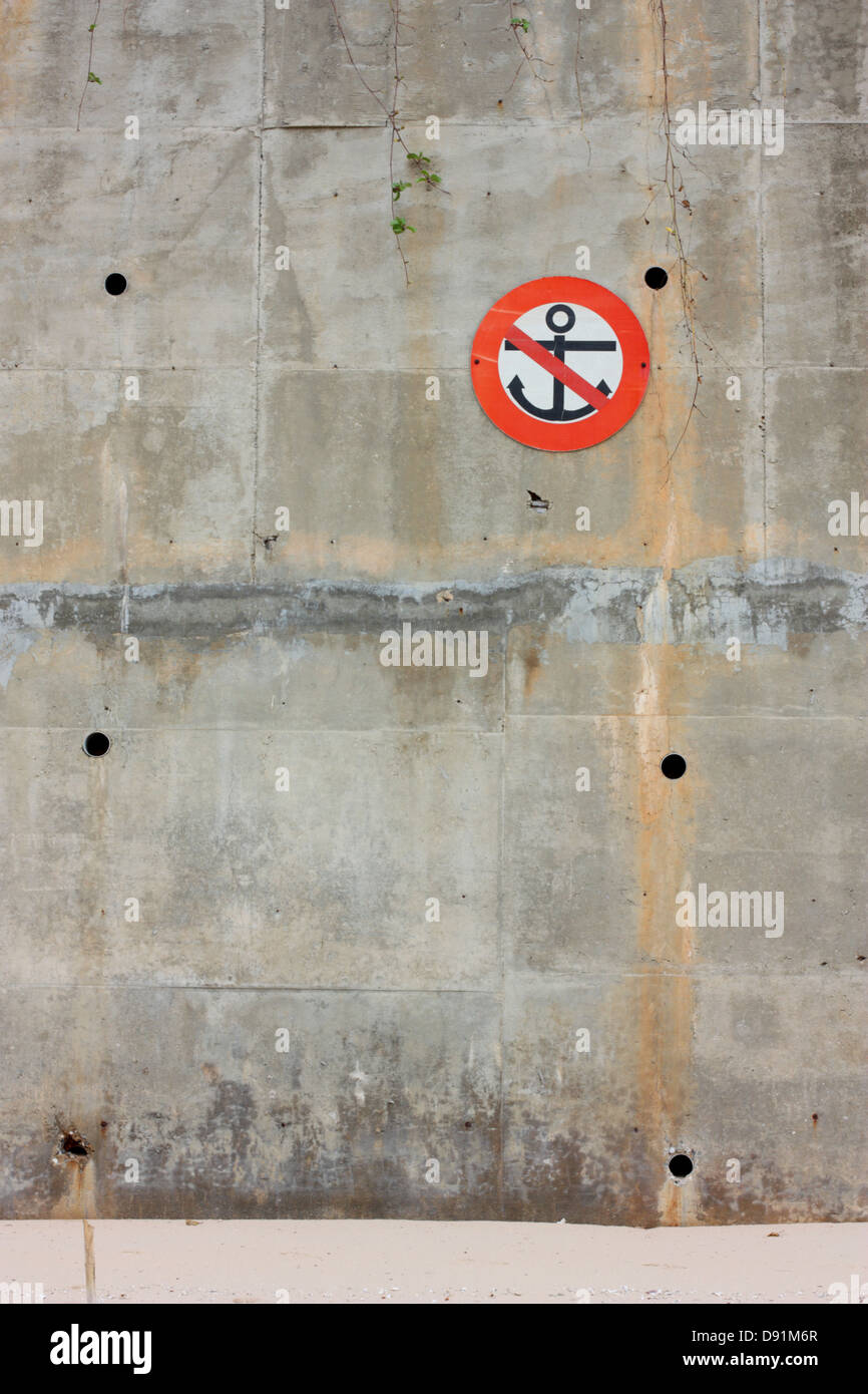 A seawall with a No Anchoring sign at a beach, Jincheng, Kinmen County ...