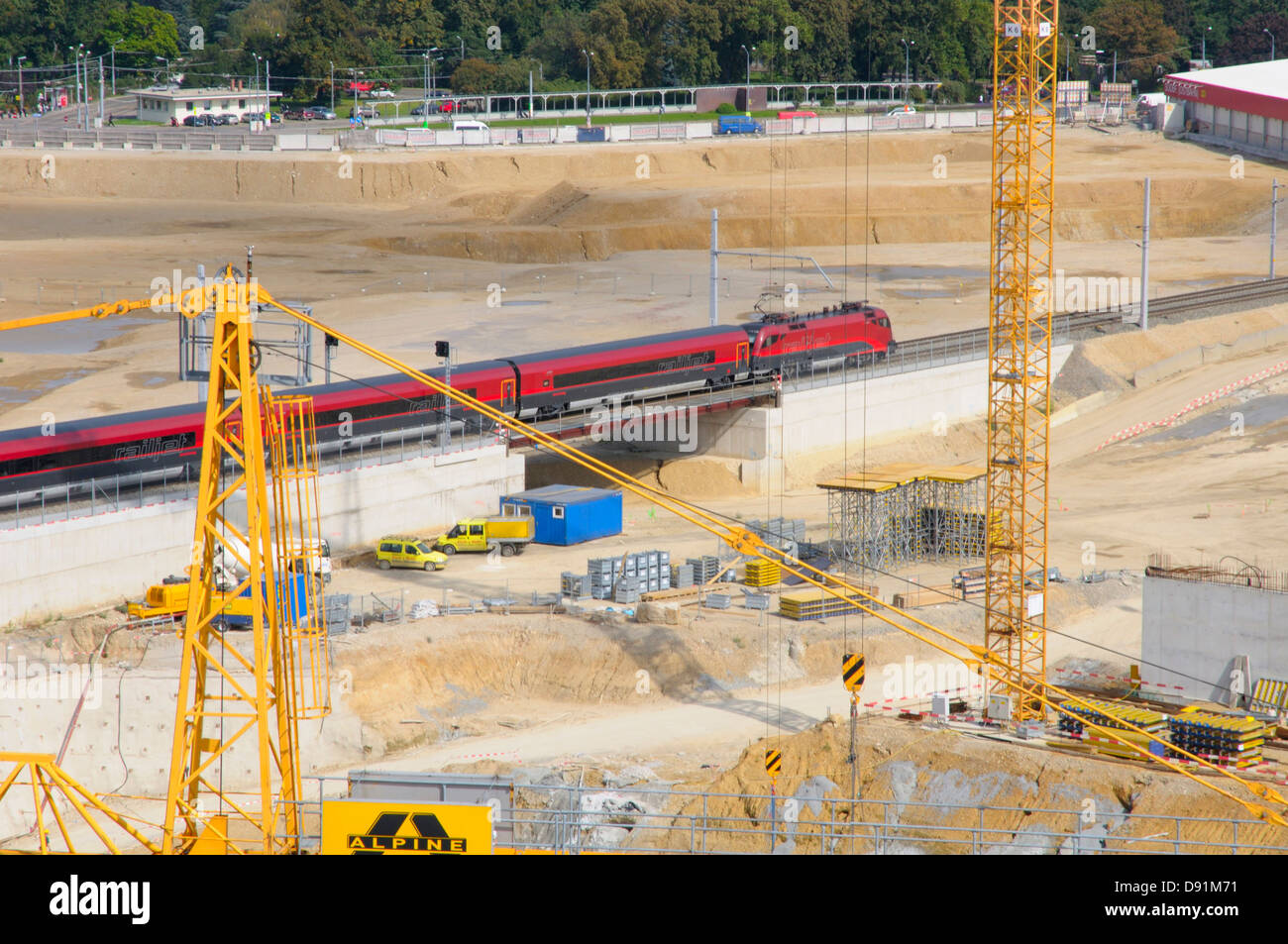 Train driving through the construction site of Vienna Central Station ...
