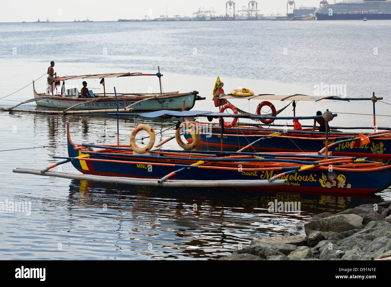 Traditional Outrigger Boat in Manila Bay, Philippines Stock Photo - Alamy