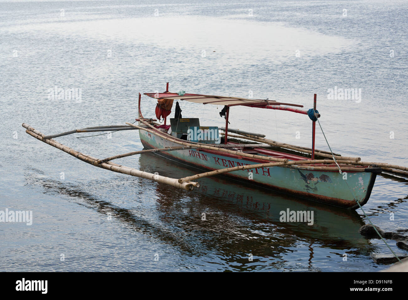 Traditional Outrigger Boat in Manila Bay, Philippines Stock Photo - Alamy