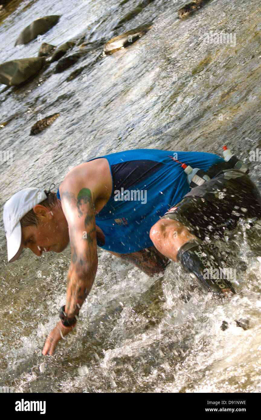 Competitors cross finish line hi-res stock photography and images - Alamy