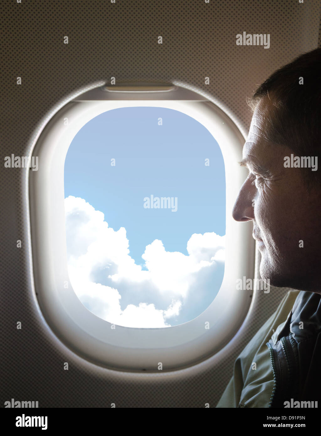 man looking into the window of the plane Stock Photo - Alamy