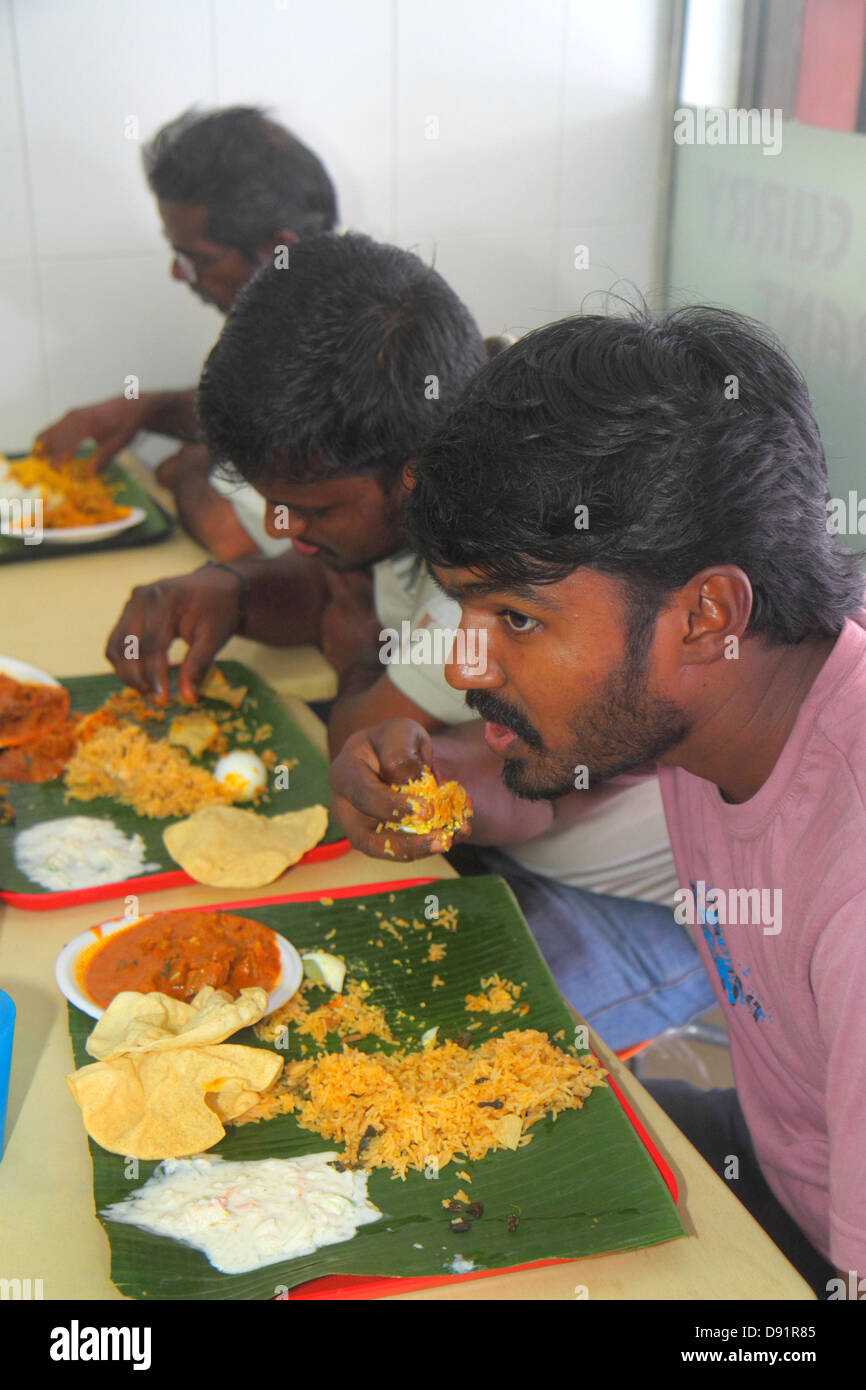 Indian man eating hi-res stock photography and images - Alamy
