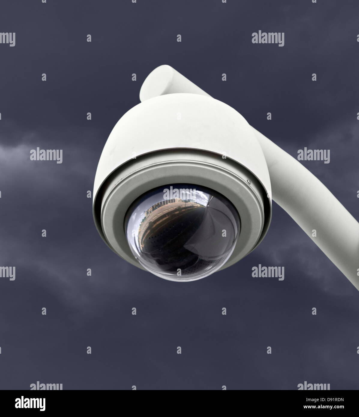 High tech overhead security camera with dark thunderstorm sky Stock ...