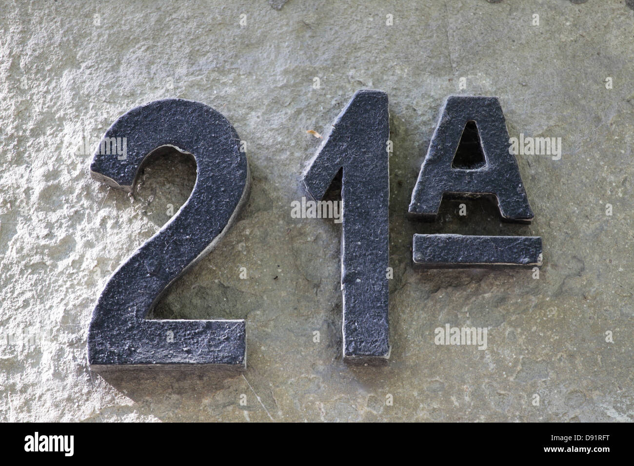 House number on a wall Stock Photo - Alamy