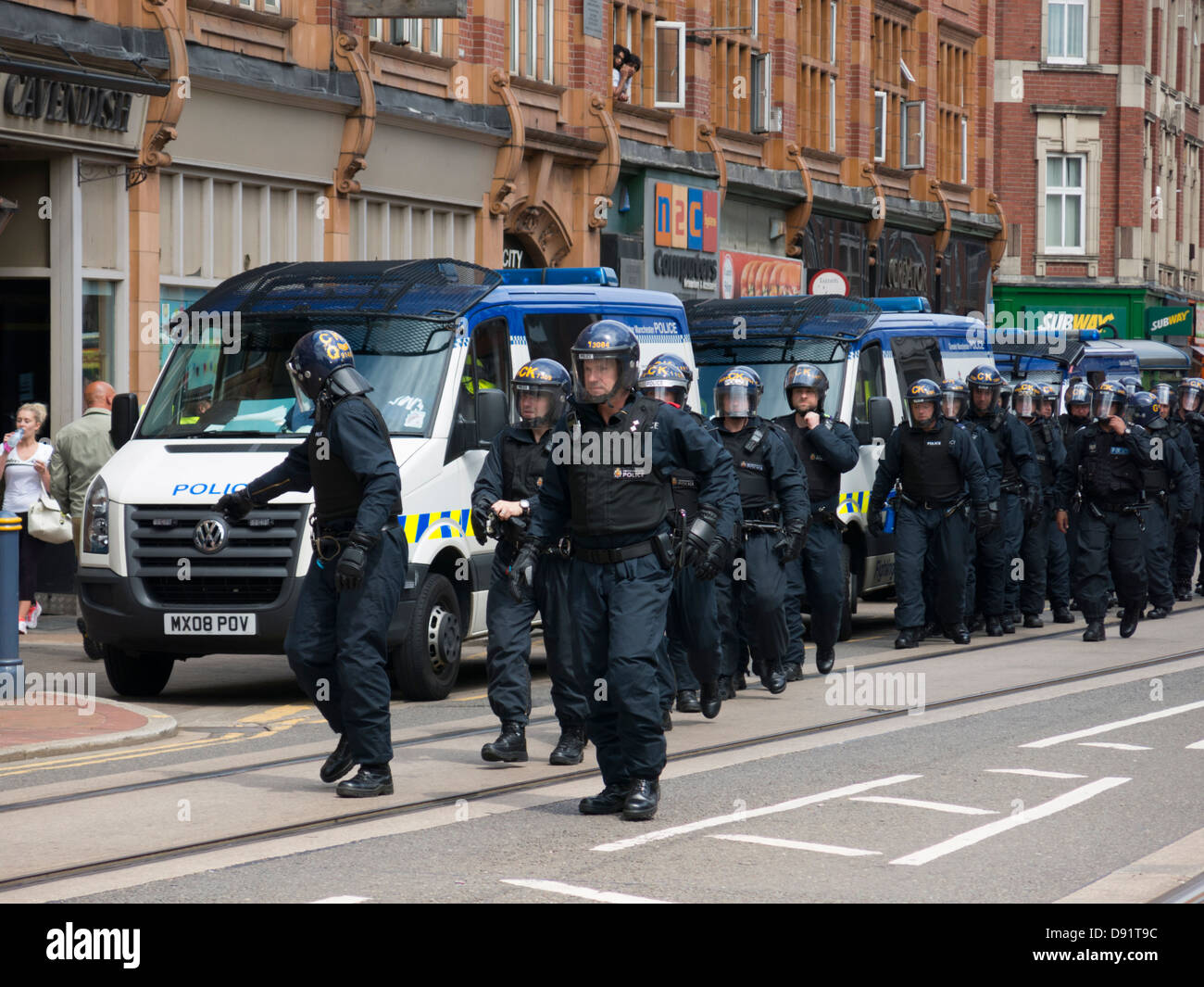 Police dressed in riot gear clash with the far right EDL supporters in ...