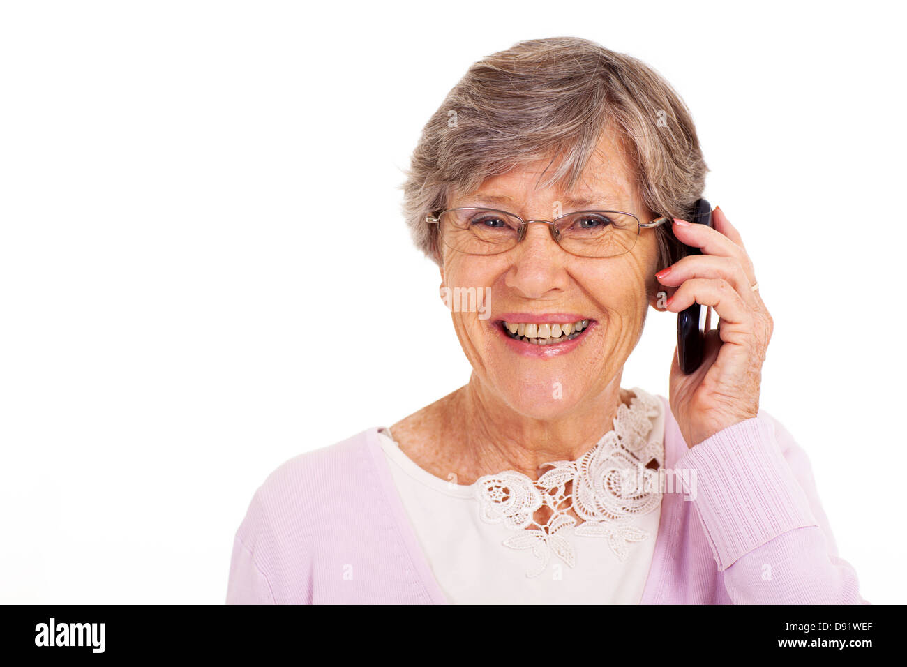happy senior woman talking on cell phone isolated on white Stock Photo ...