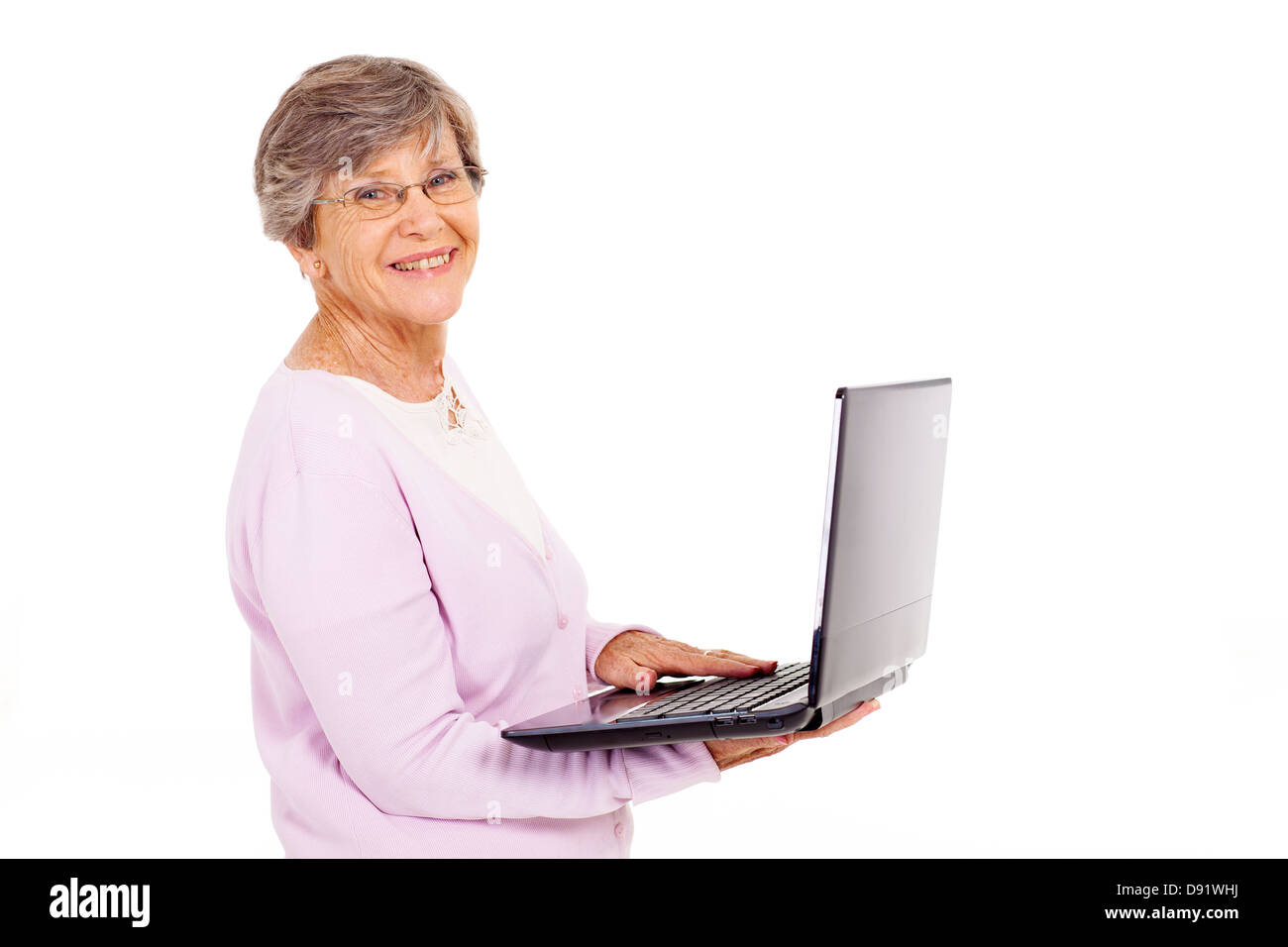 elderly woman with laptop computer isolated on white Stock Photo - Alamy