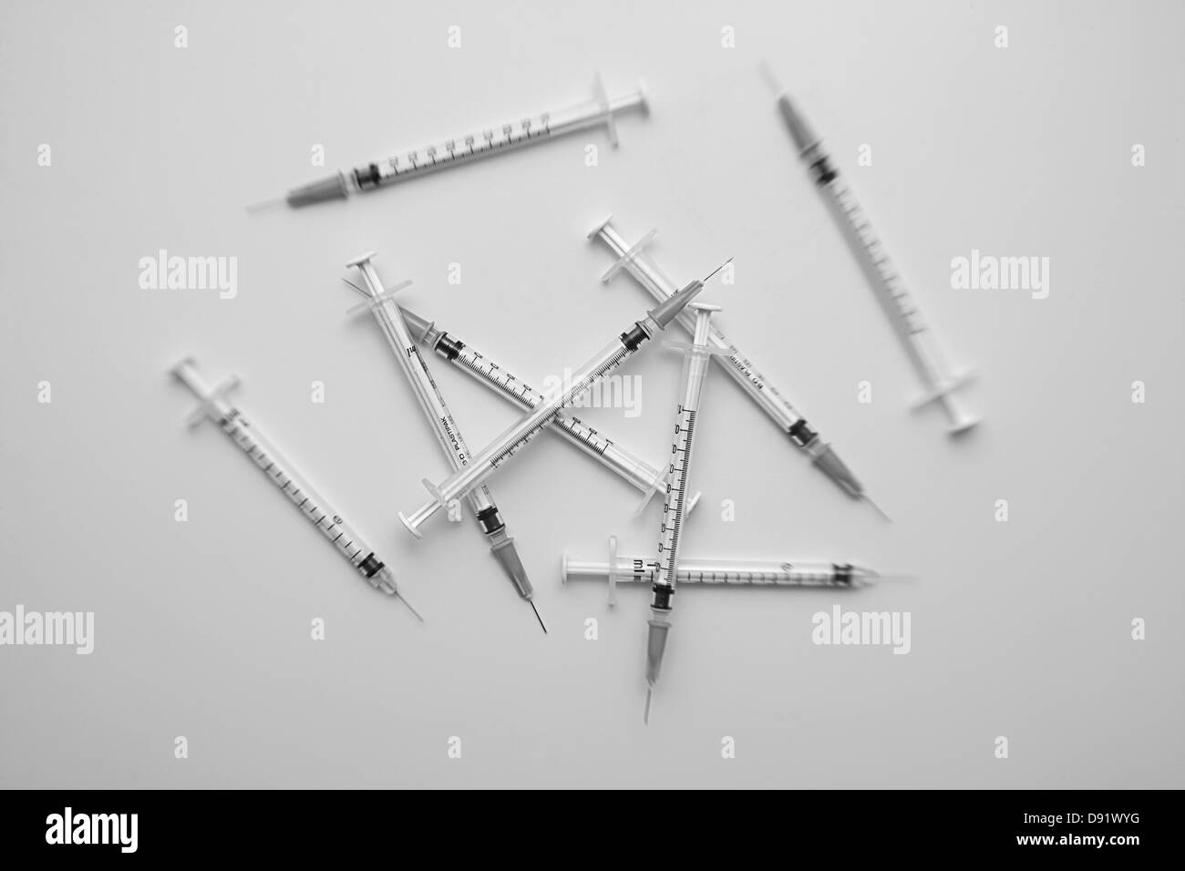 group of nine with needles attached Stock Photo - Alamy