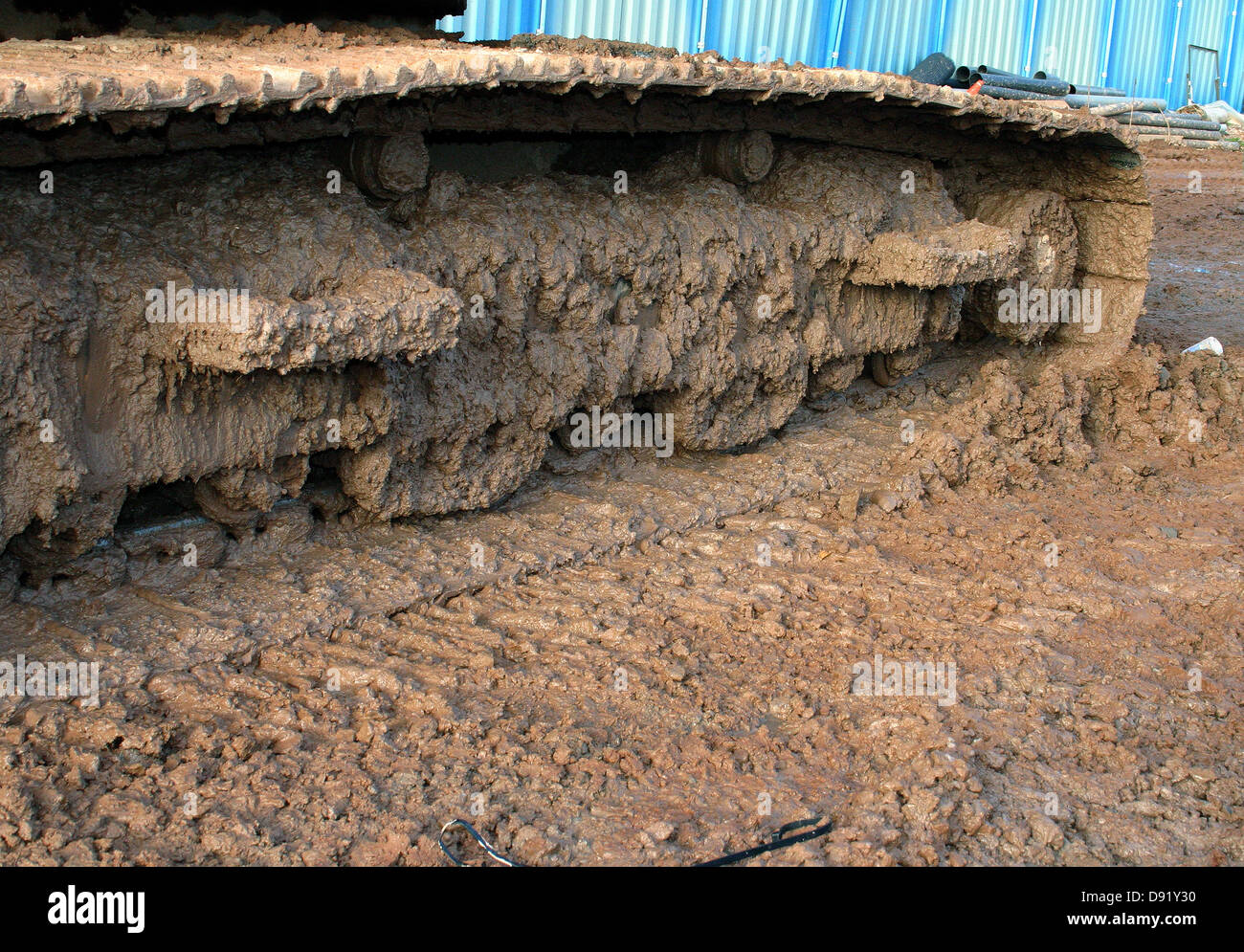 Muddy tracks, very wet and muddy tracks on a piece of construction ...