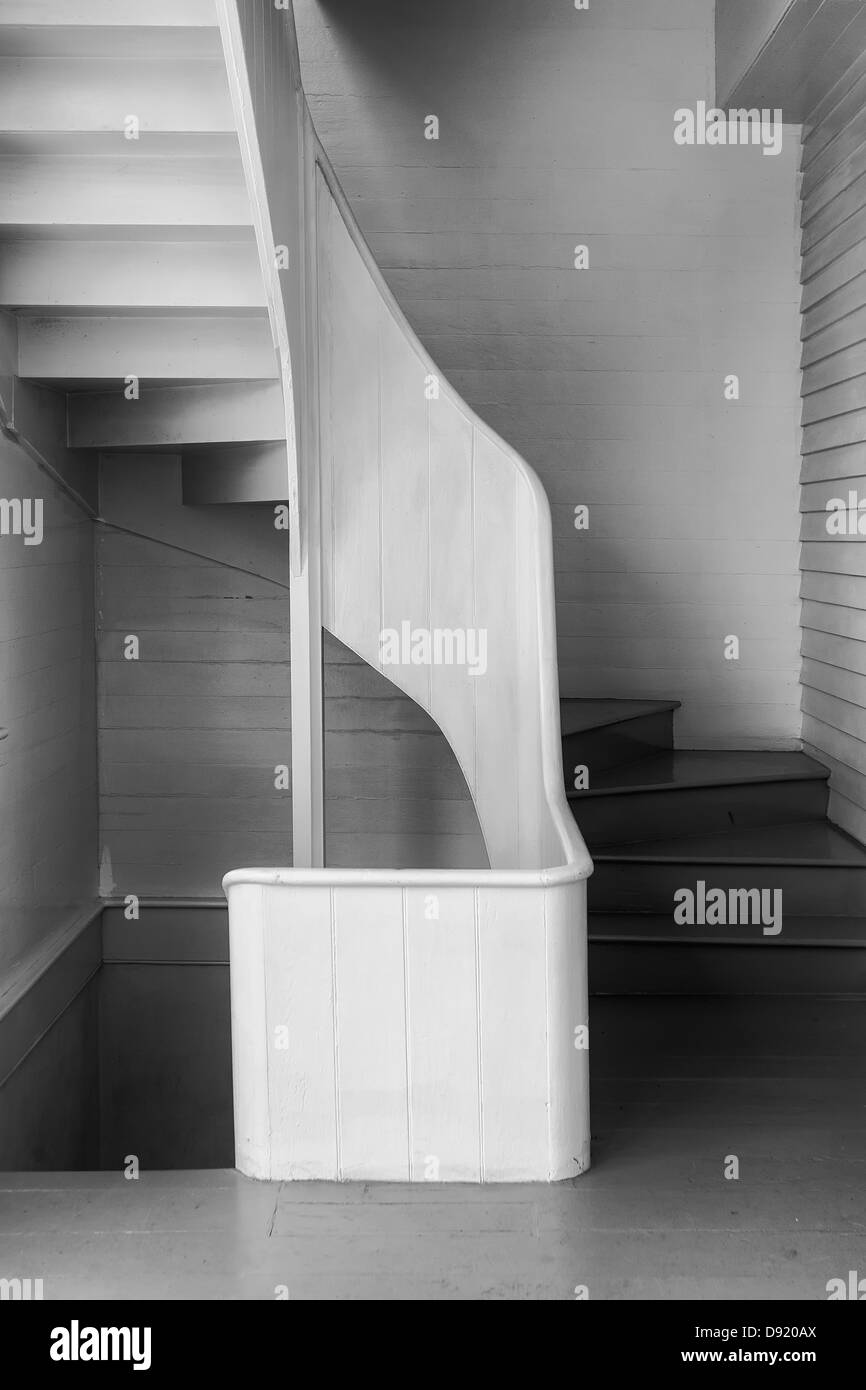 B&W image of an interior stair well in the style of Edward Weston. For ...