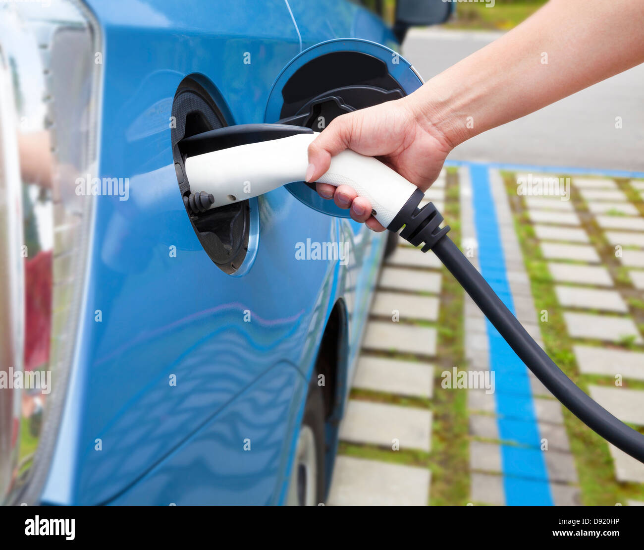 Green electric hand hi-res stock photography and images - Alamy