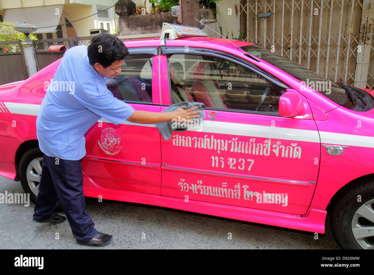 Person cleaning his taxi hi-res stock photography and images - Alamy