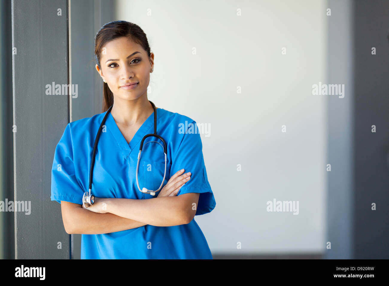 attractive young medical intern portrait in office Stock Photo - Alamy