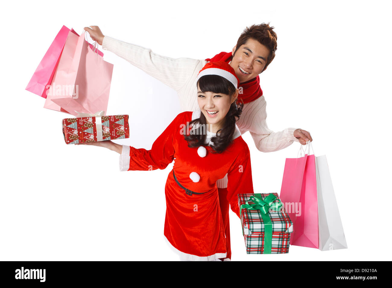 Young couple celebrating Christmas Stock Photo - Alamy
