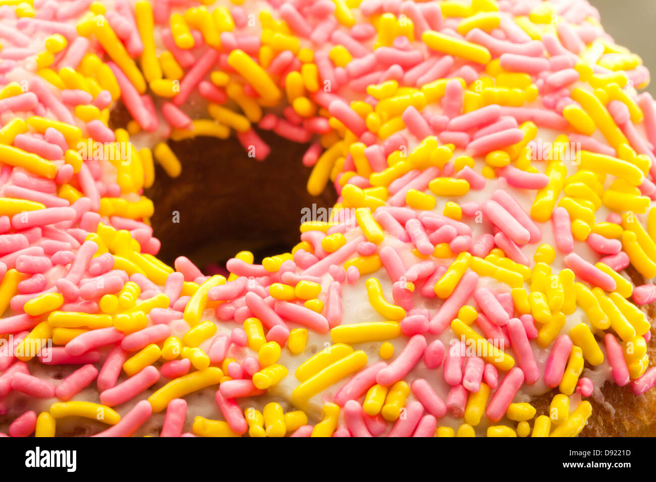 Close up of sprinkle donut Stock Photo - Alamy