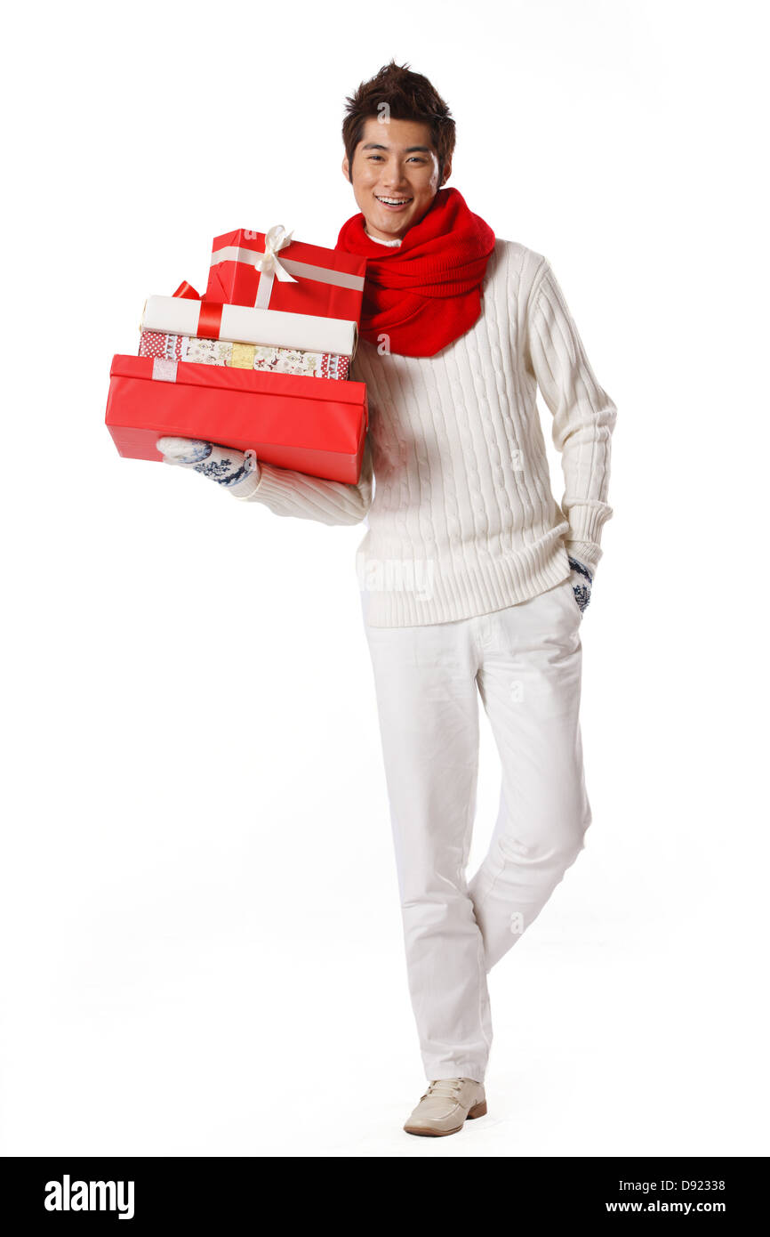 Hands holding present stack Cut Out Stock Images & Pictures - Alamy