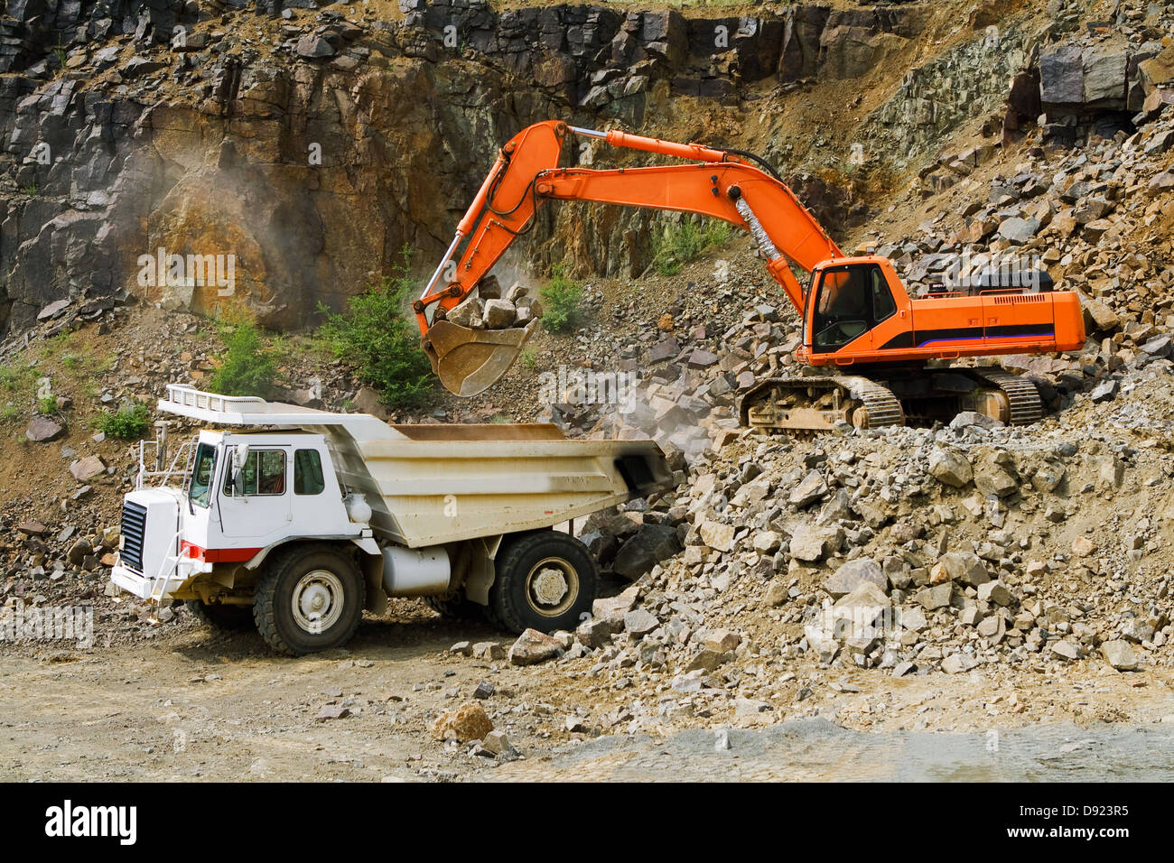 Excavation and dump vehicle in a granite quarry Stock Photo - Alamy