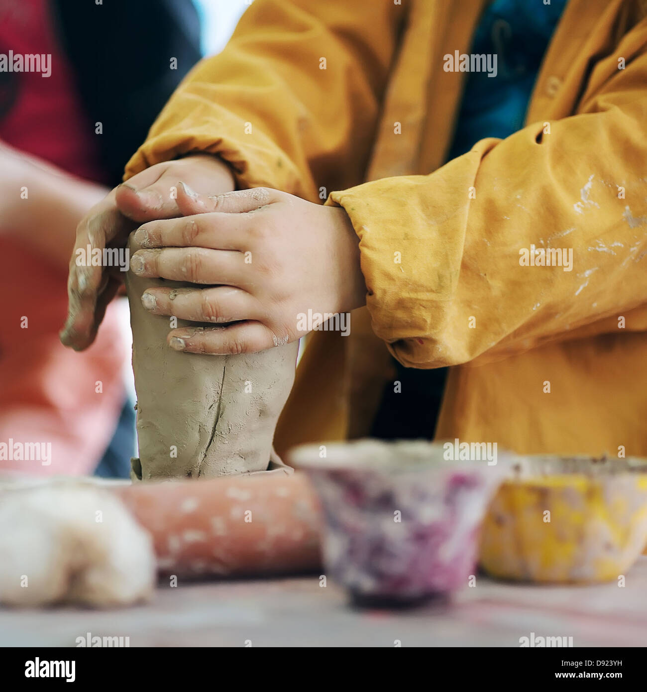 boy teen potter clay bowl working in pottery workshop traditional arts ...