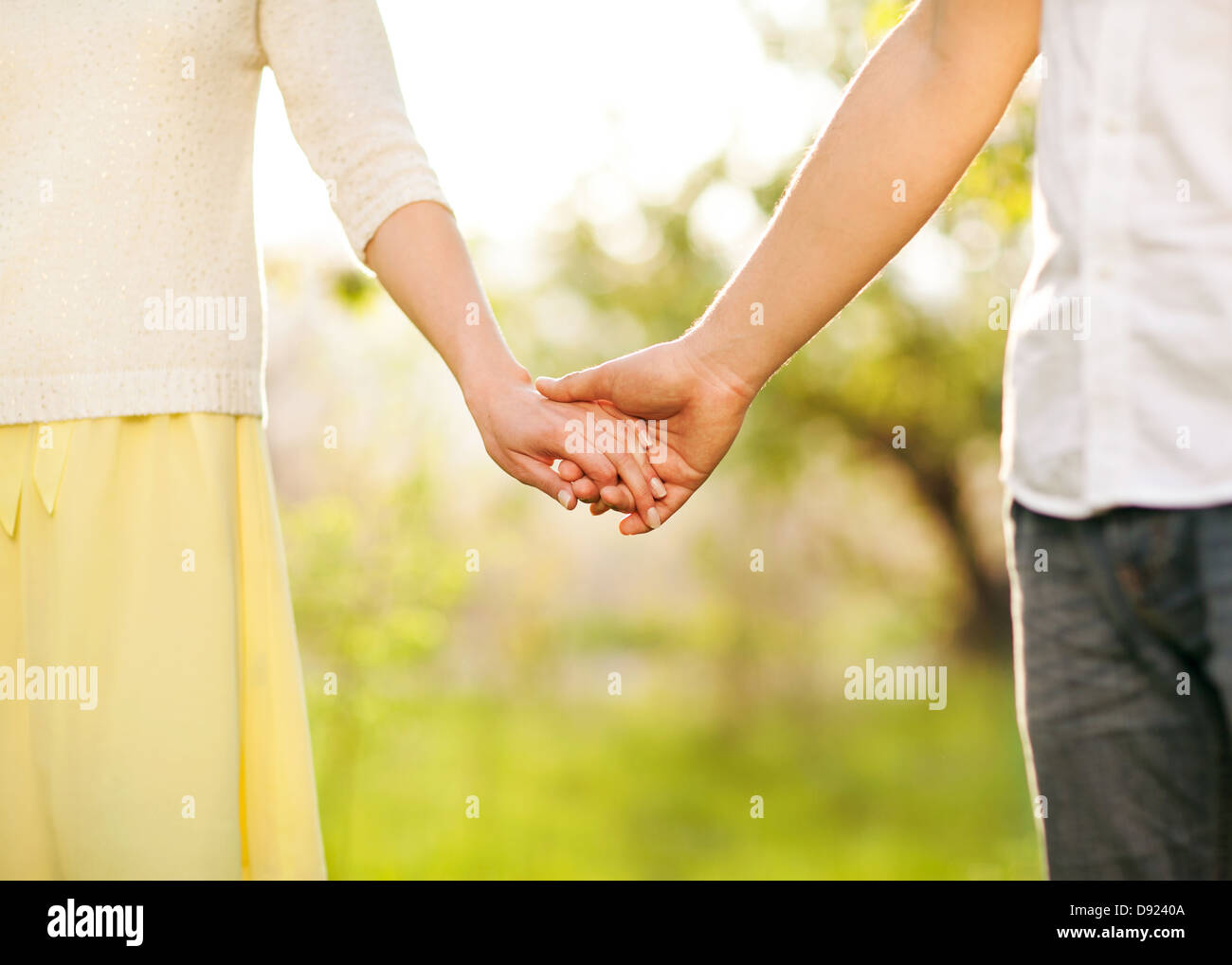 Close-up Holding Hands Stock Photo - Alamy