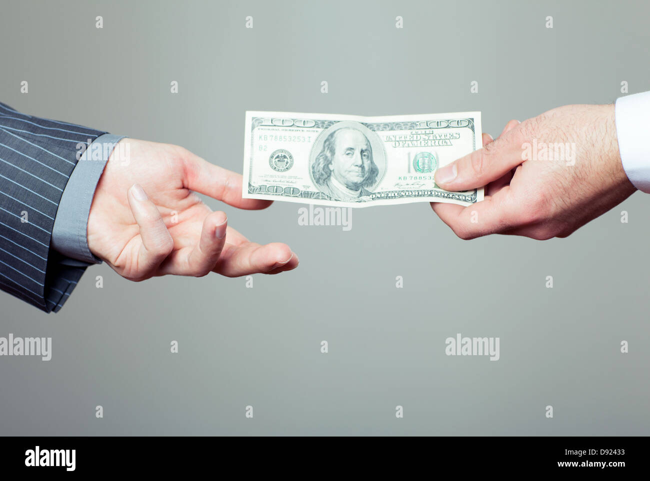 Hand giving paper another hand hi-res stock photography and images - Alamy
