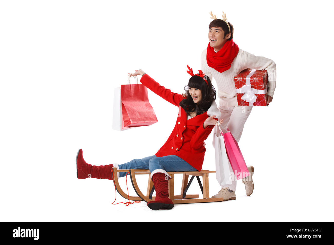 Cheerful couple on christmas Cut Out Stock Images & Pictures - Alamy