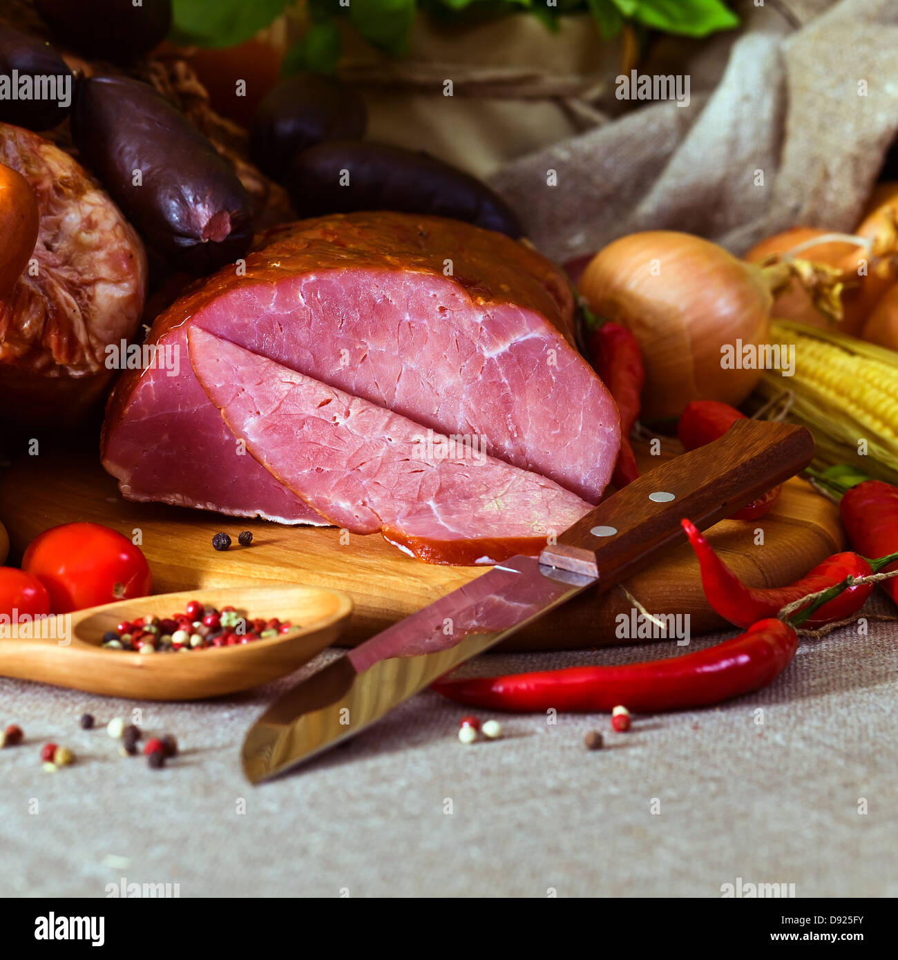 smoked meat and sausages on a linen cloth Stock Photo - Alamy